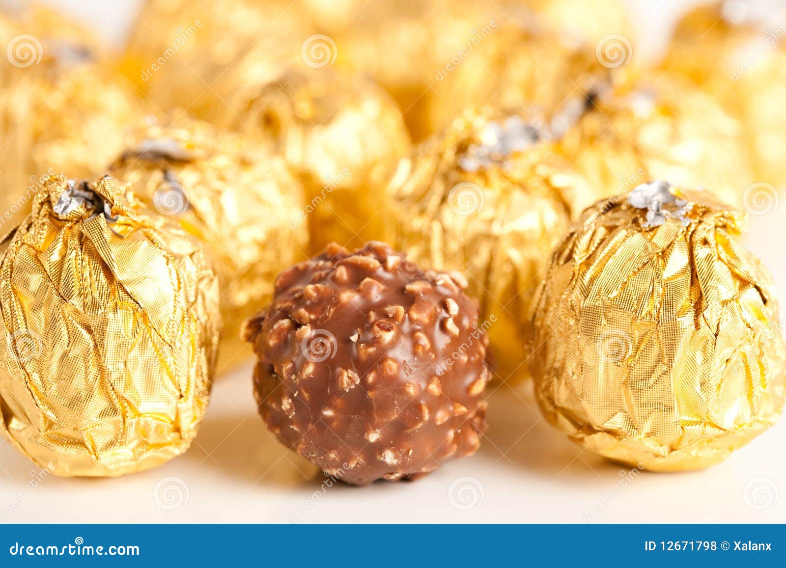 Delicious Candy in Golden Foil Stock Photo - Image of seasoning ...