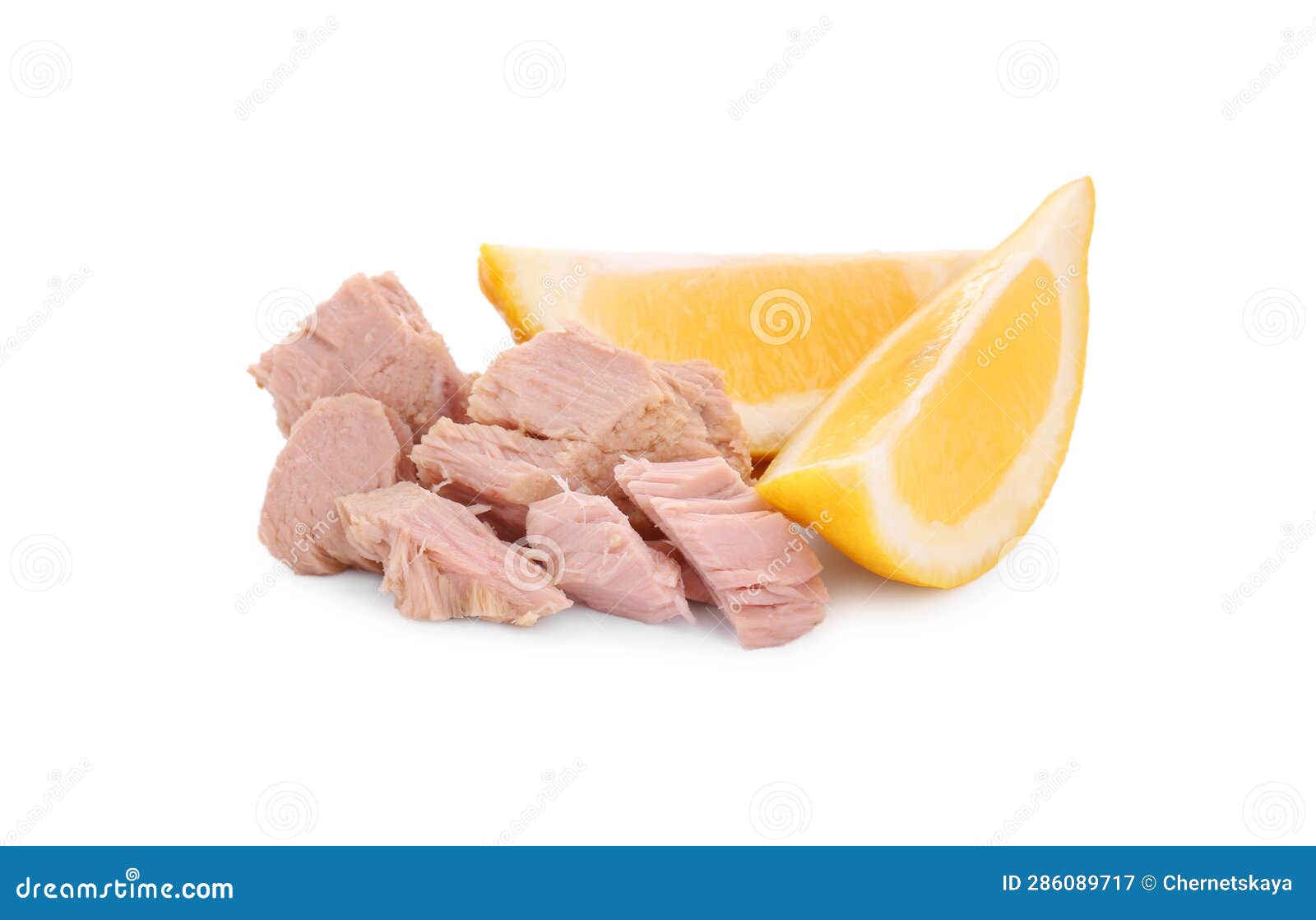 Delicious Canned Tuna Chunks with Lemon Isolated on White Stock Image ...