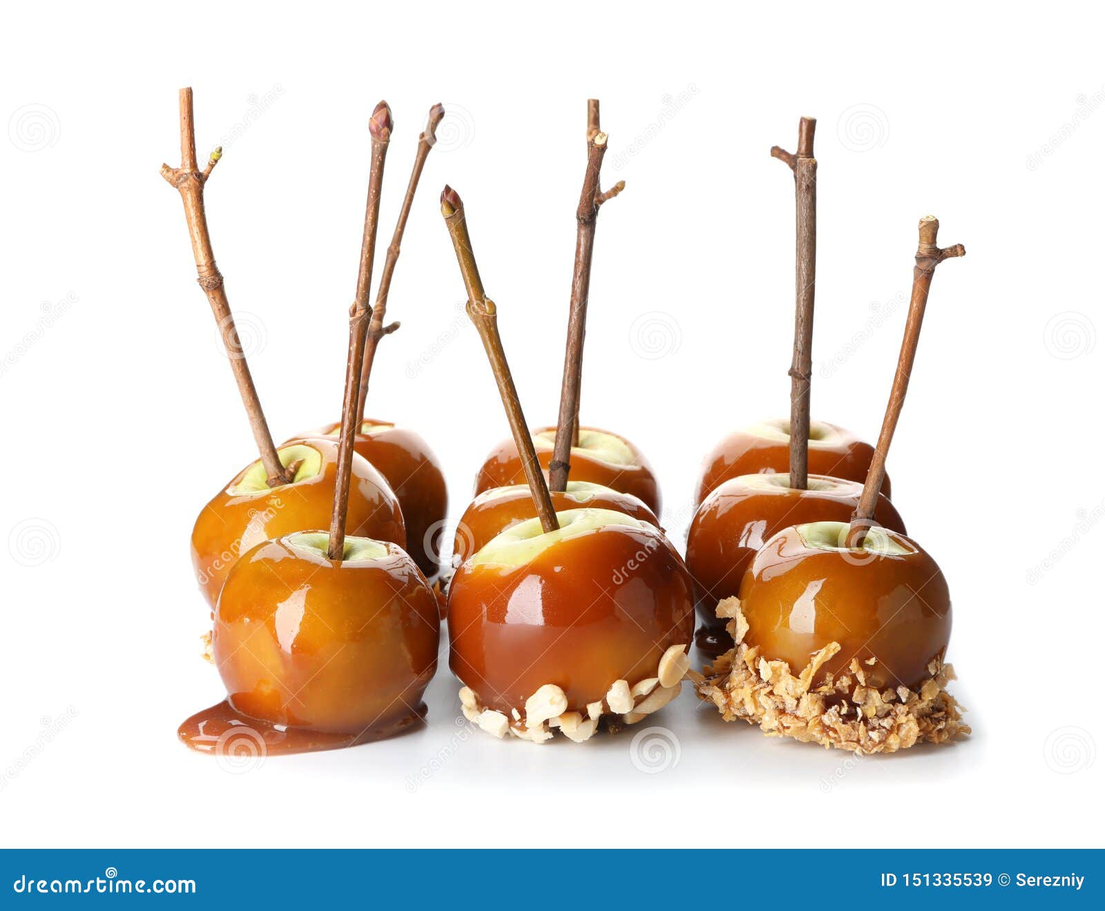 Delicious Caramel Apples with Tree Branches on White Background Stock ...