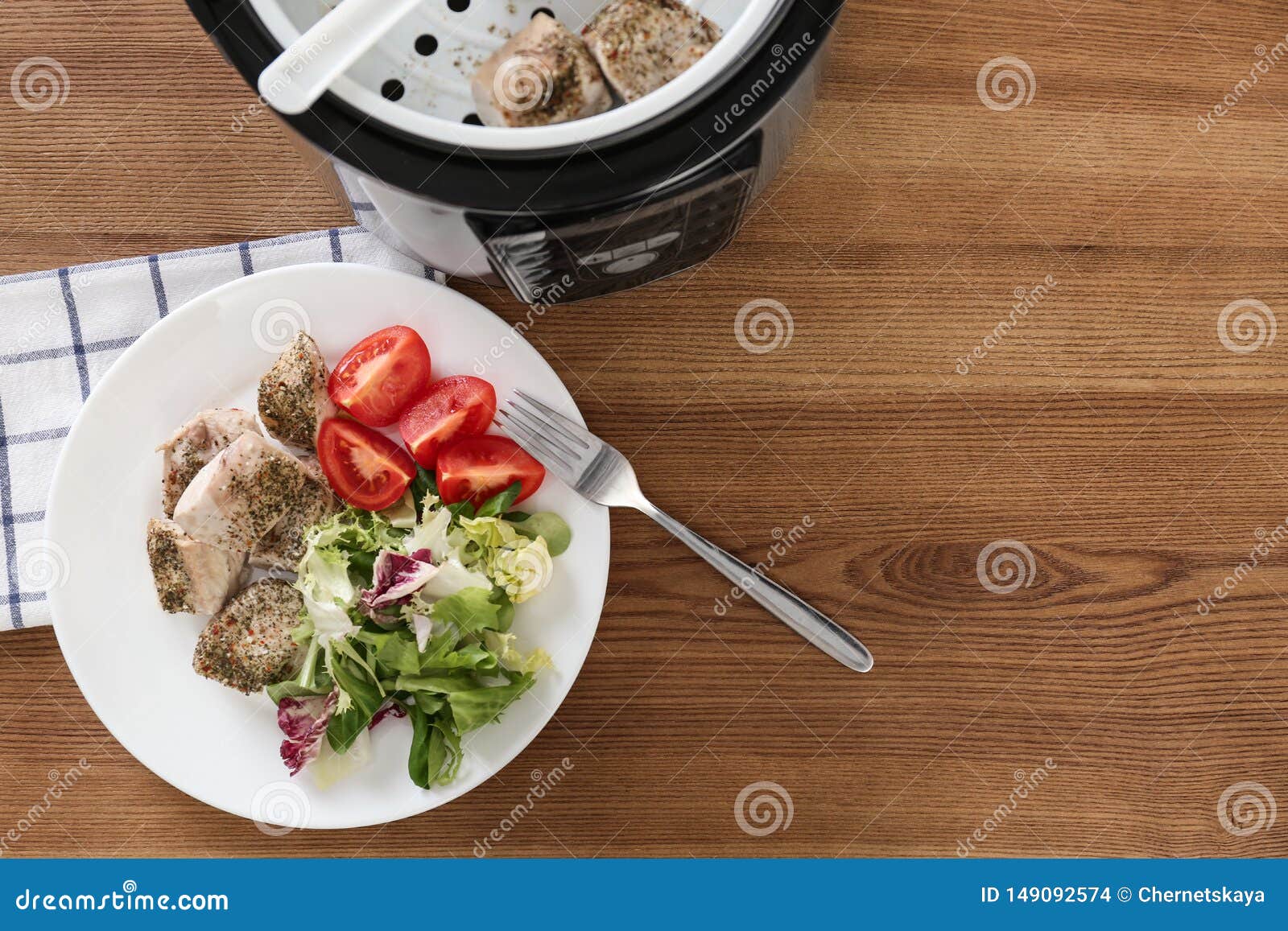 Delicious Chicken with Vegetables and Modern Multi Cooker on Wooden ...