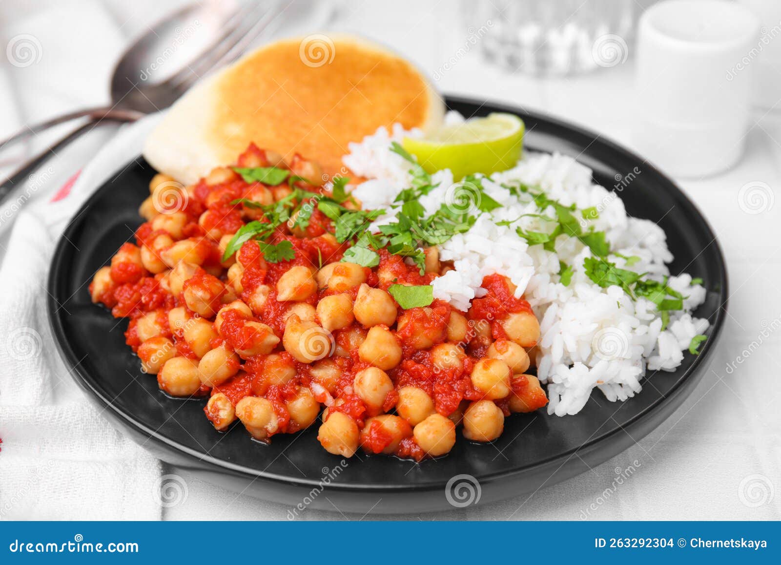Delicious Chickpea Curry with Rice on Table, Closeup Stock Photo ...