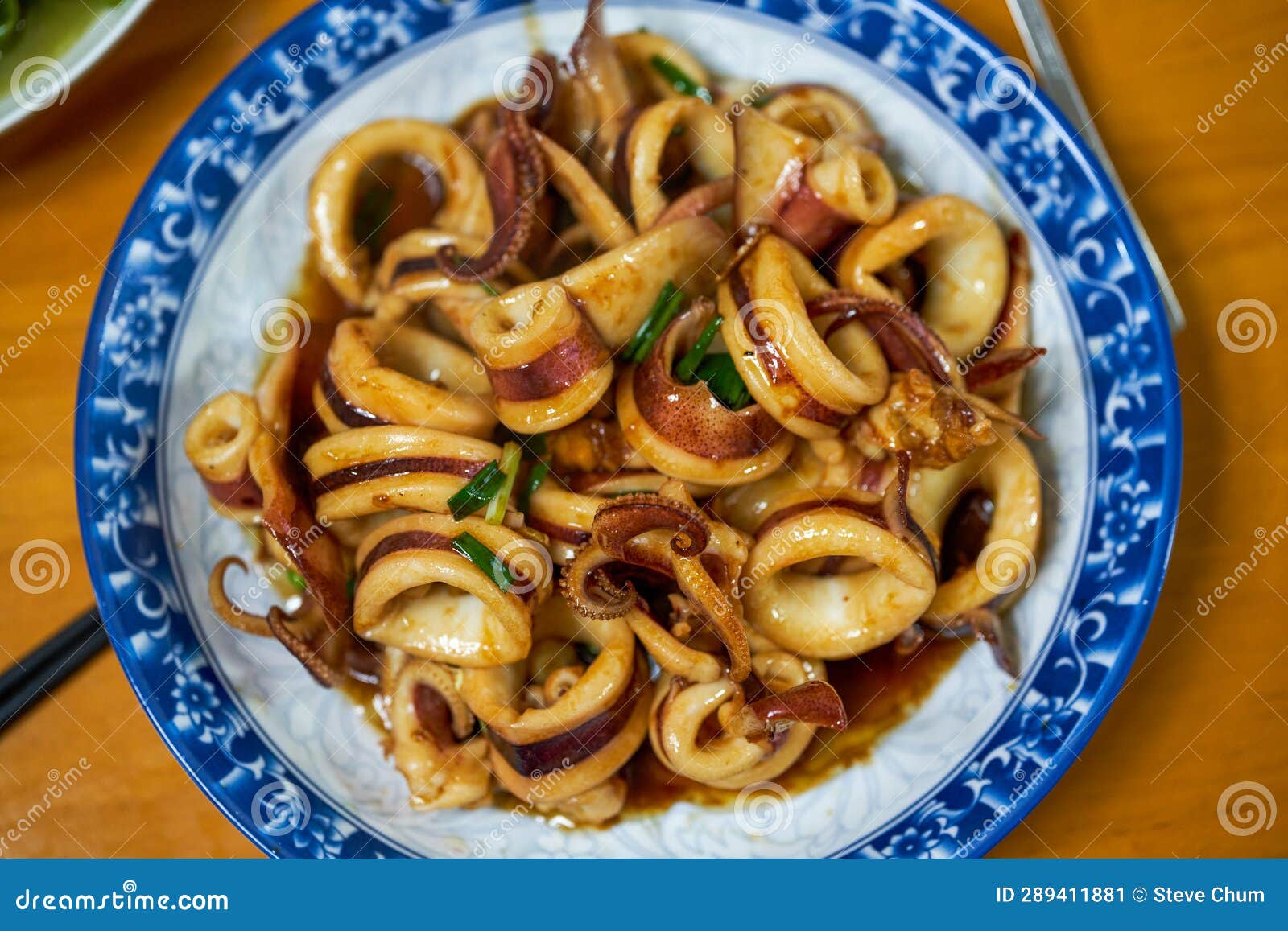 A Delicious Chinese Dish with Fried Fresh Squid in Sauce Stock Image ...