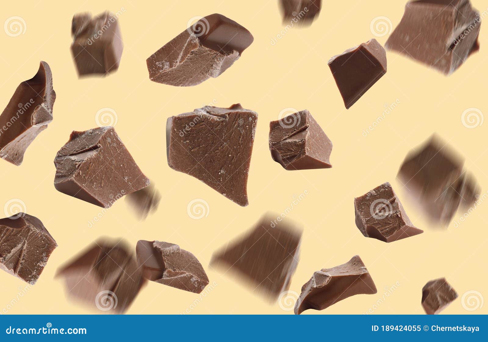 Delicious Chocolate Pieces Falling on Background Stock Image - Image of ...