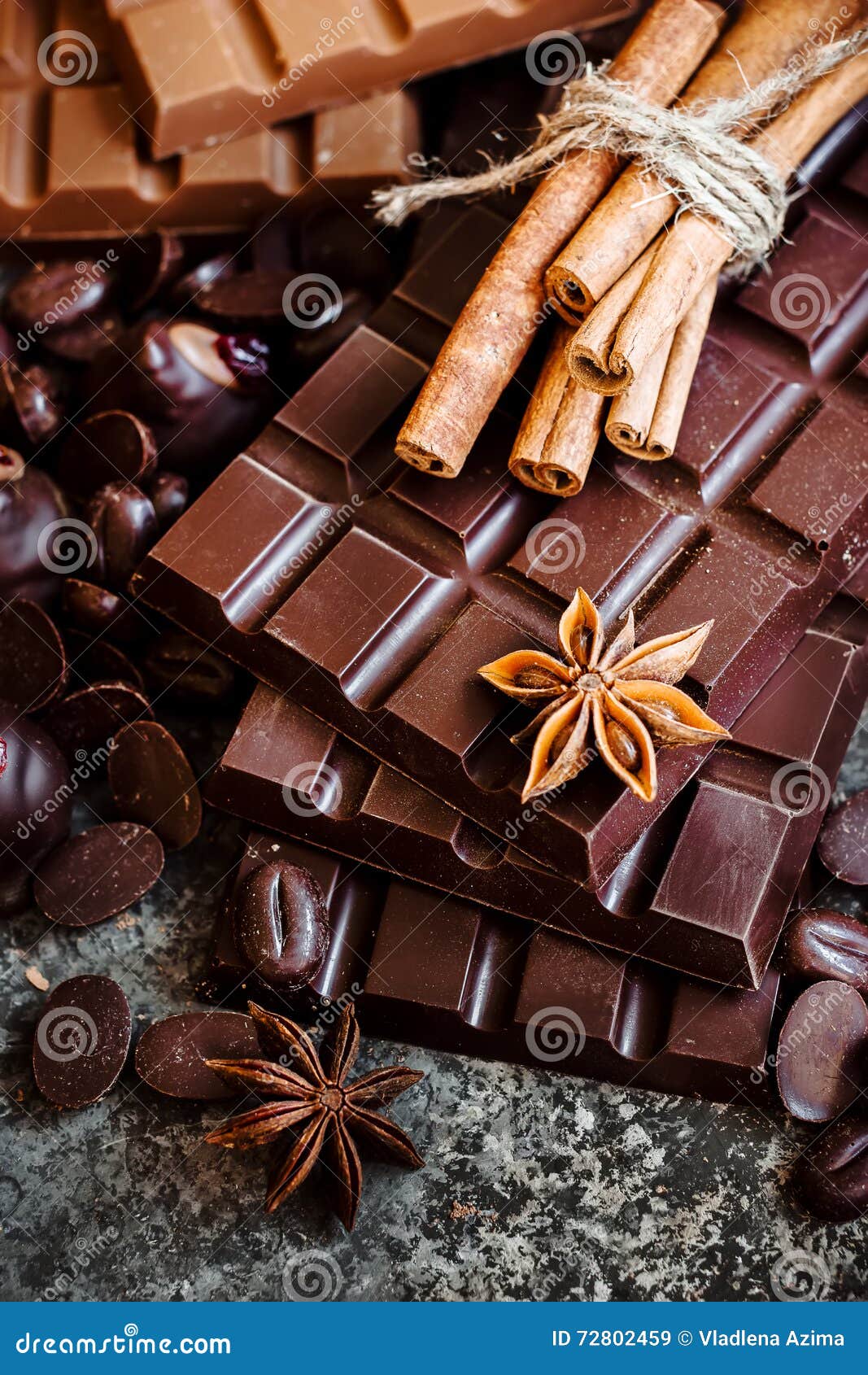 Delicious Chocolates and Spices on a Dark Background. Stock Image ...