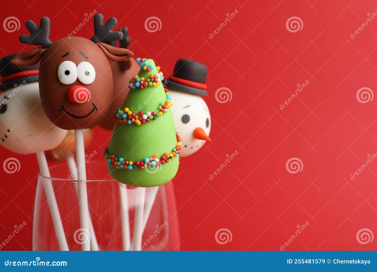 Delicious Christmas Themed Cake Pops on Red Background, Closeup. Space ...