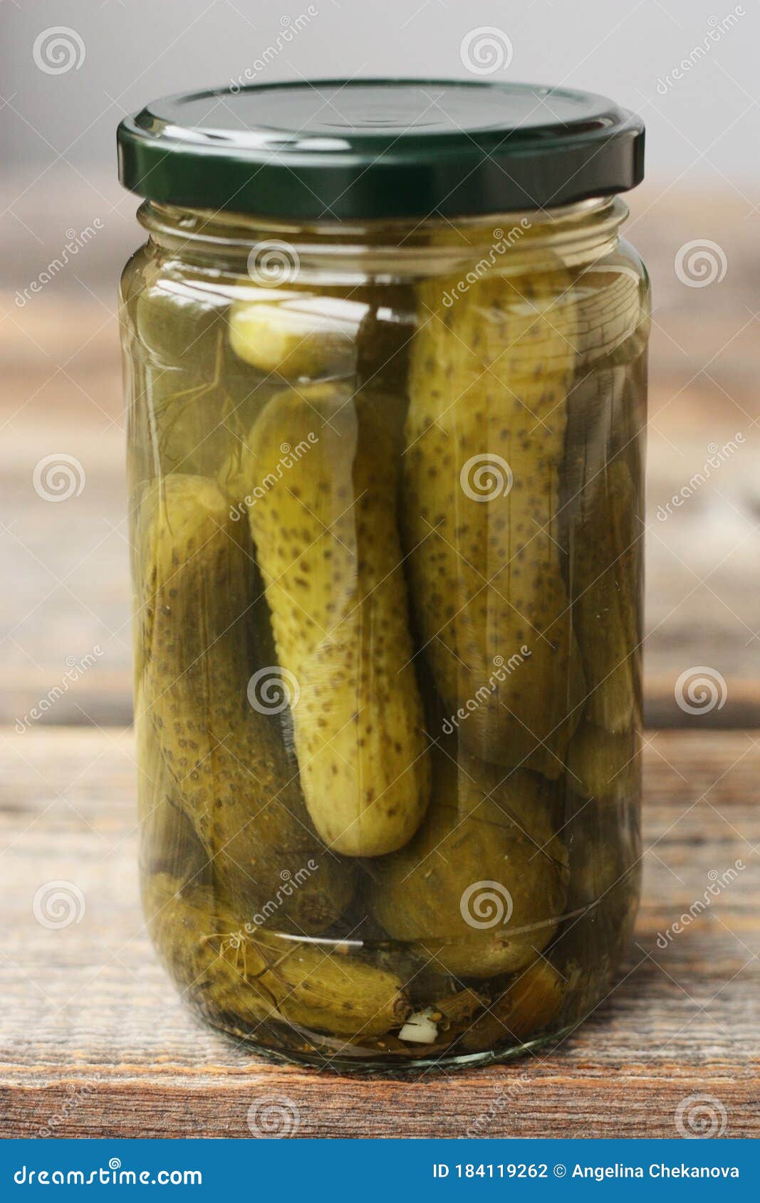 Delicious Cornichons in a Jar on the Table Stock Photo - Image of green ...
