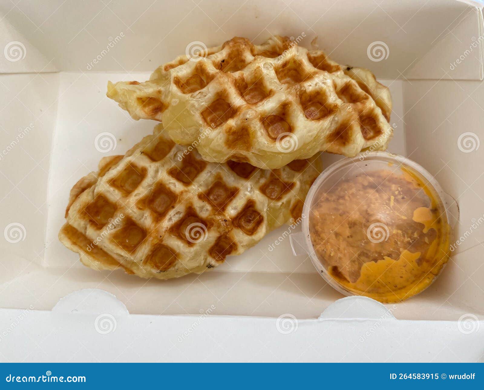 Delicious Craffles or Waffles with Cheese in a White Case. Isolated ...