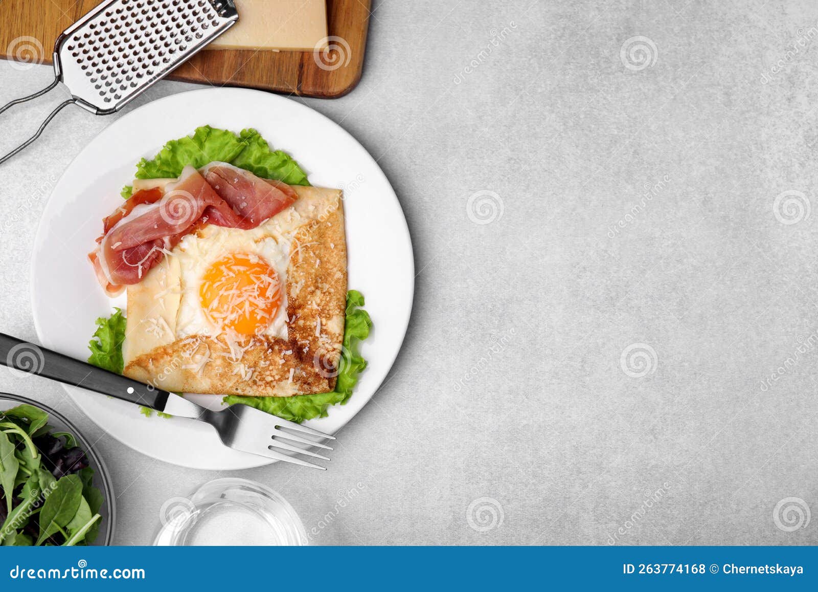 Delicious Crepe with Egg Served on Light Gray Table, Flat Lay with ...
