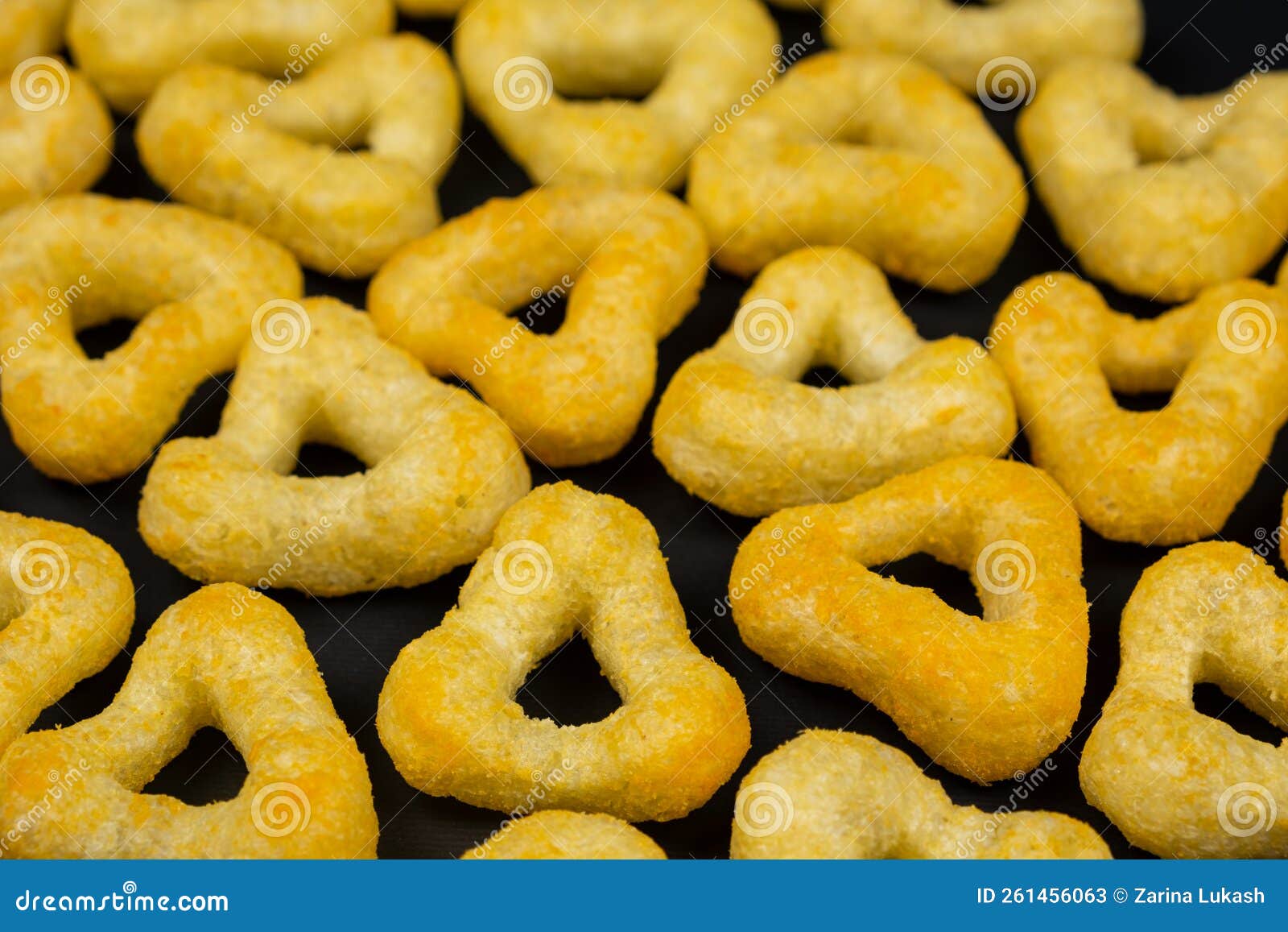 Delicious Crispy Corn Chips Triangular Shape with Spices on a Black ...