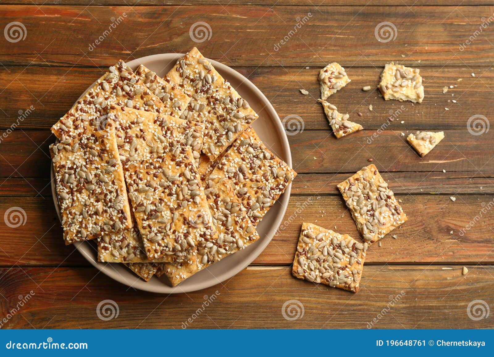 Delicious Crispy Crackers on Wooden Table, Flat Lay Stock Image - Image ...