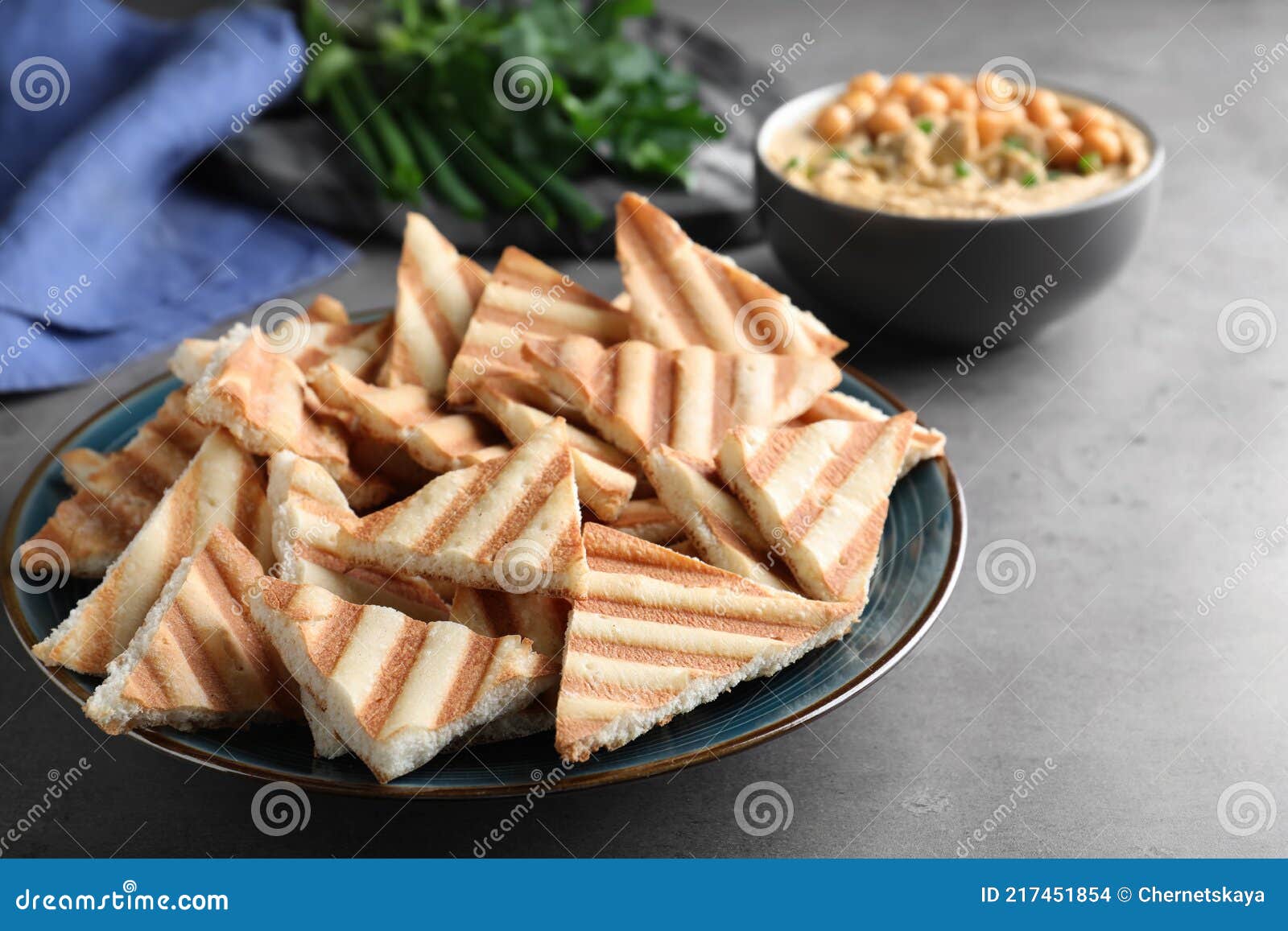Delicious Crispy Pita Chips on Grey Table Stock Photo - Image of ...