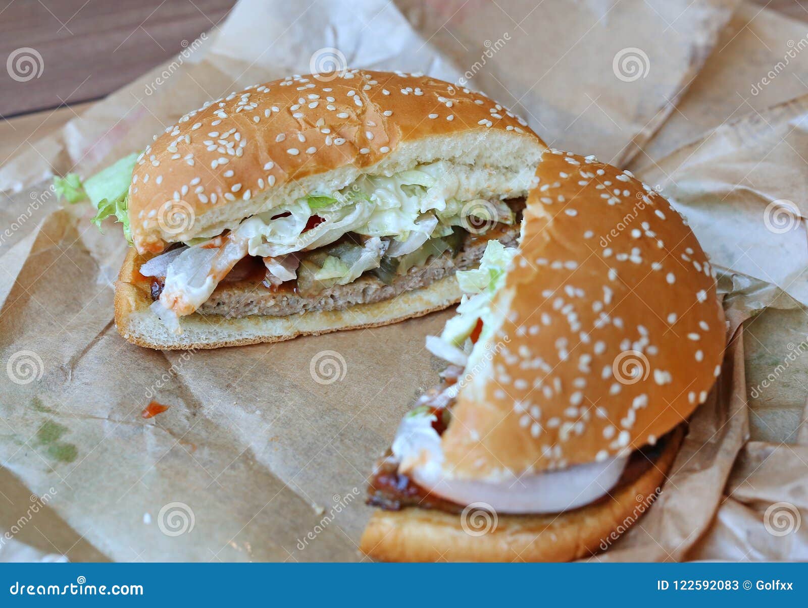 Cut Half Beef Burger on Paper Stock Image - Image of mustard, hamburger ...