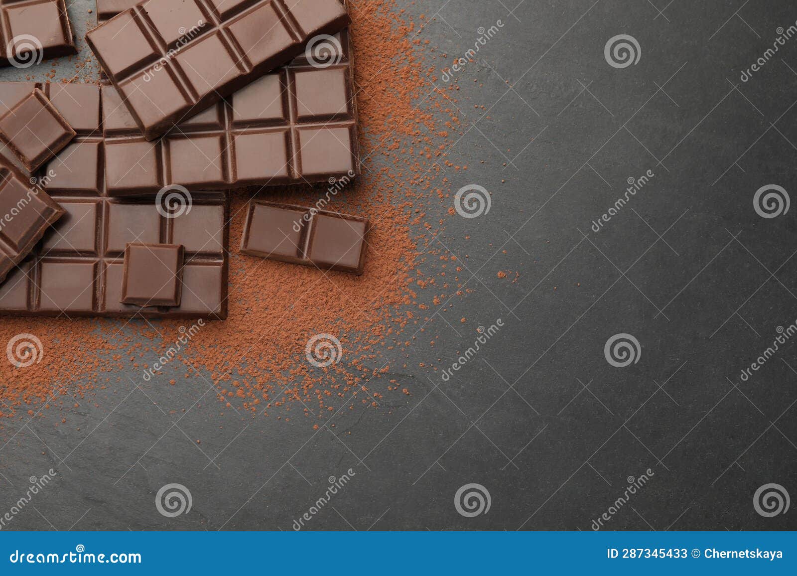 Delicious Dark Chocolate and Cocoa Powder on Black Table, Flat Lay ...