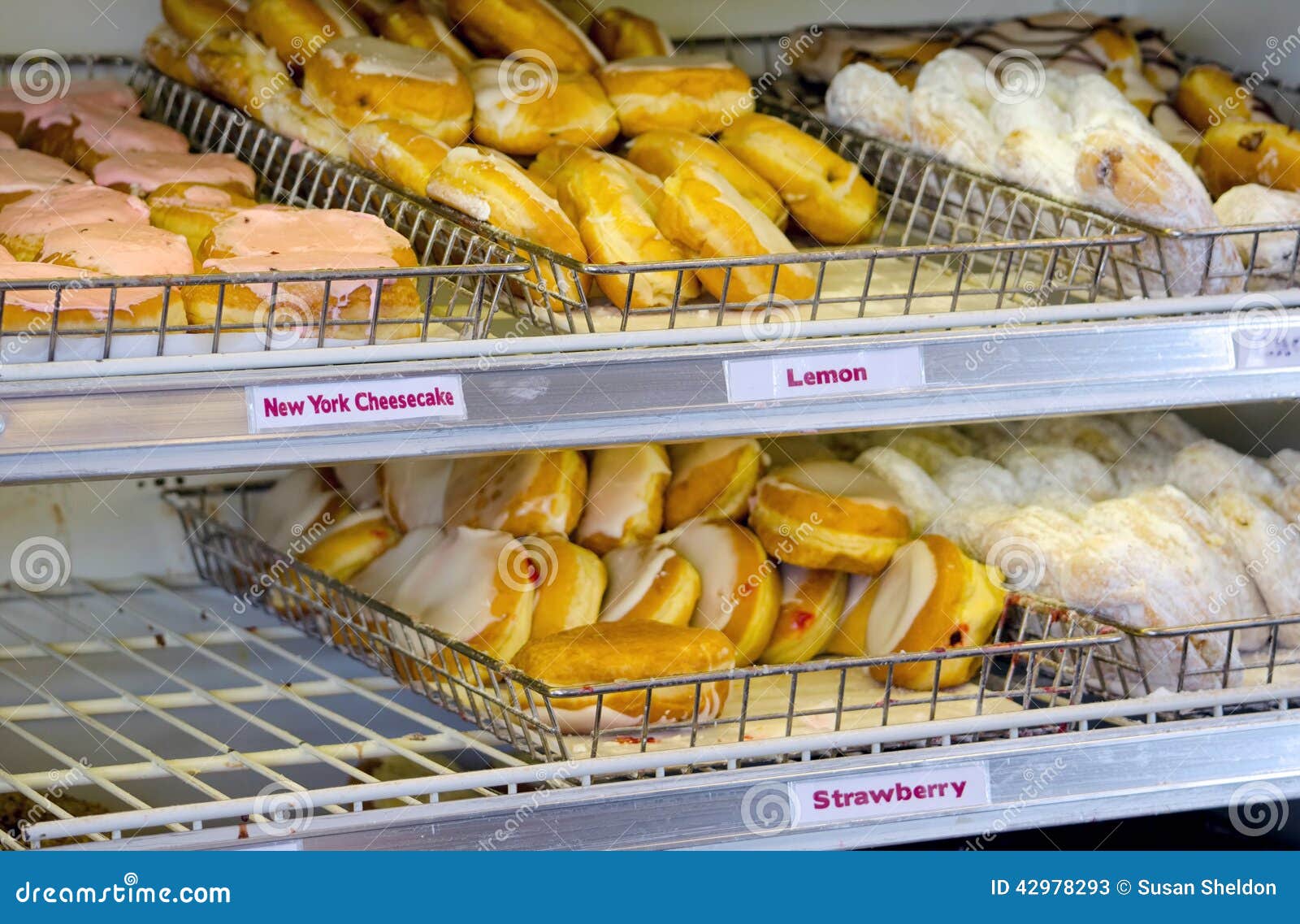 Delicious Donuts in bakery stock image. Image of edible - 42978293