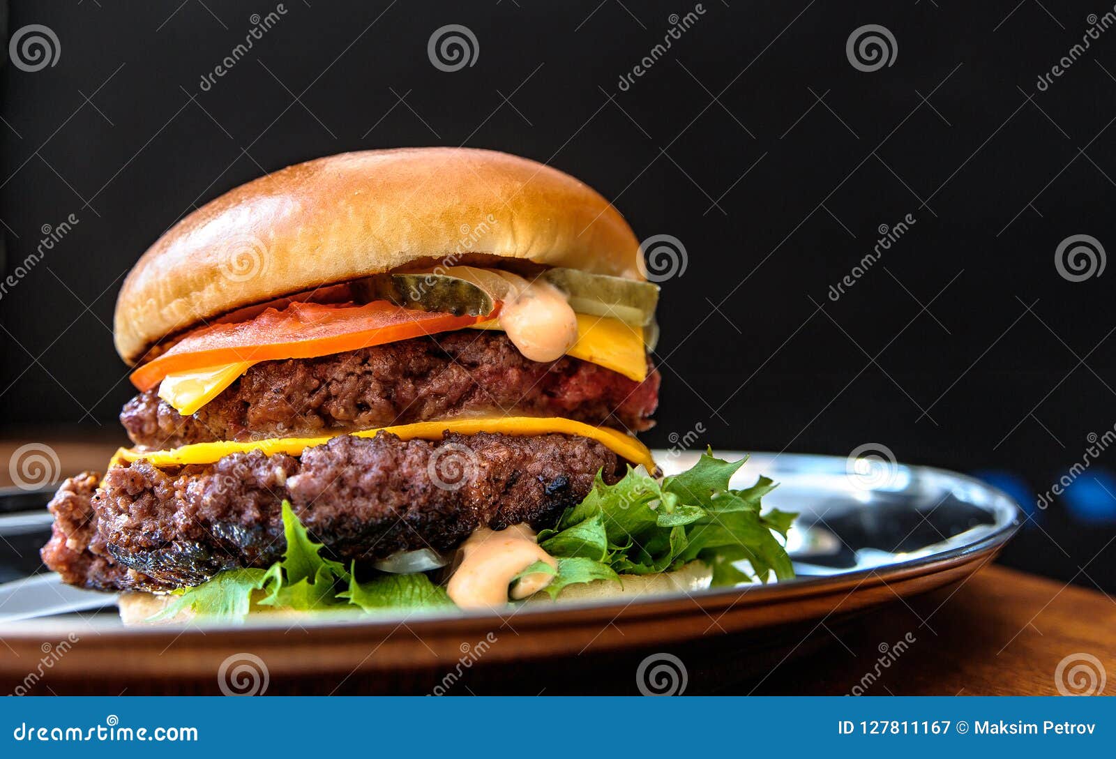 Delicious Double Cheeseburger on a Metal Plate Stock Image - Image of ...