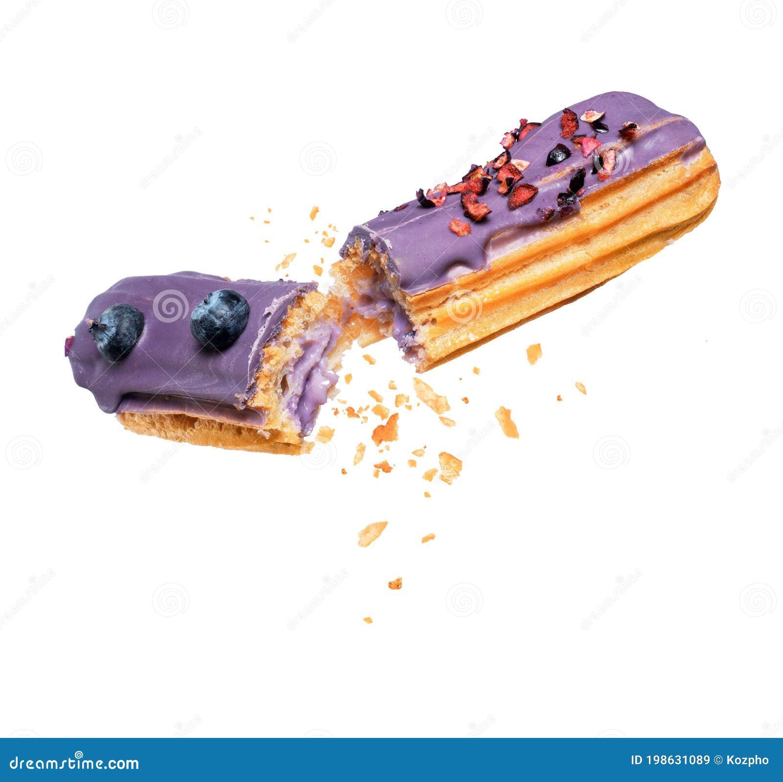 Delicious Eclair with Blueberries Broken into Two Halves in the Air ...