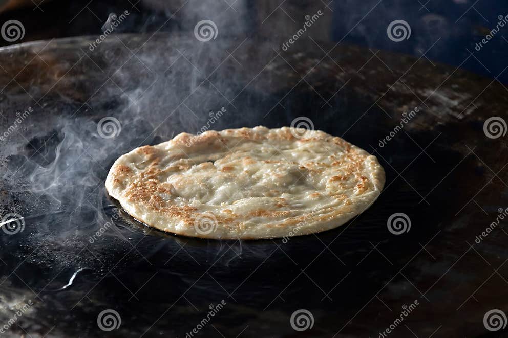 Delicious Flatbread Cooking on Hot Surface Stock Image - Image of ...