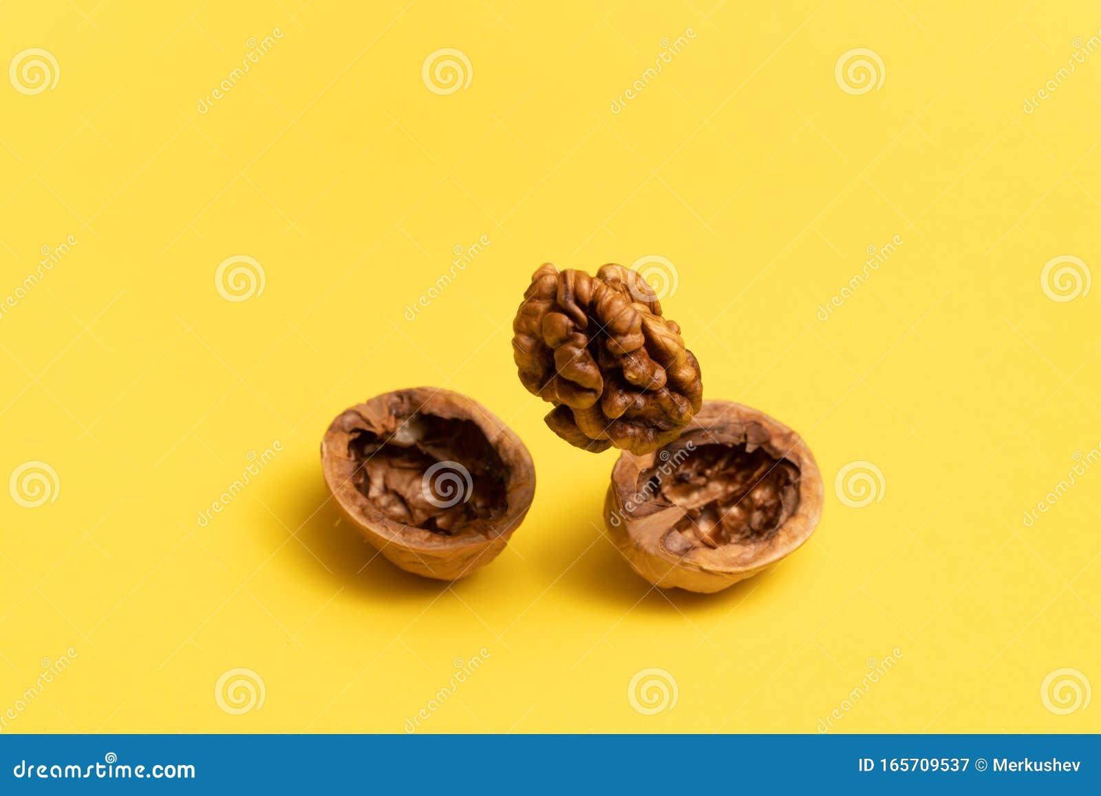 Delicious Flying Walnut on Yellow Background. Stock Image - Image of ...