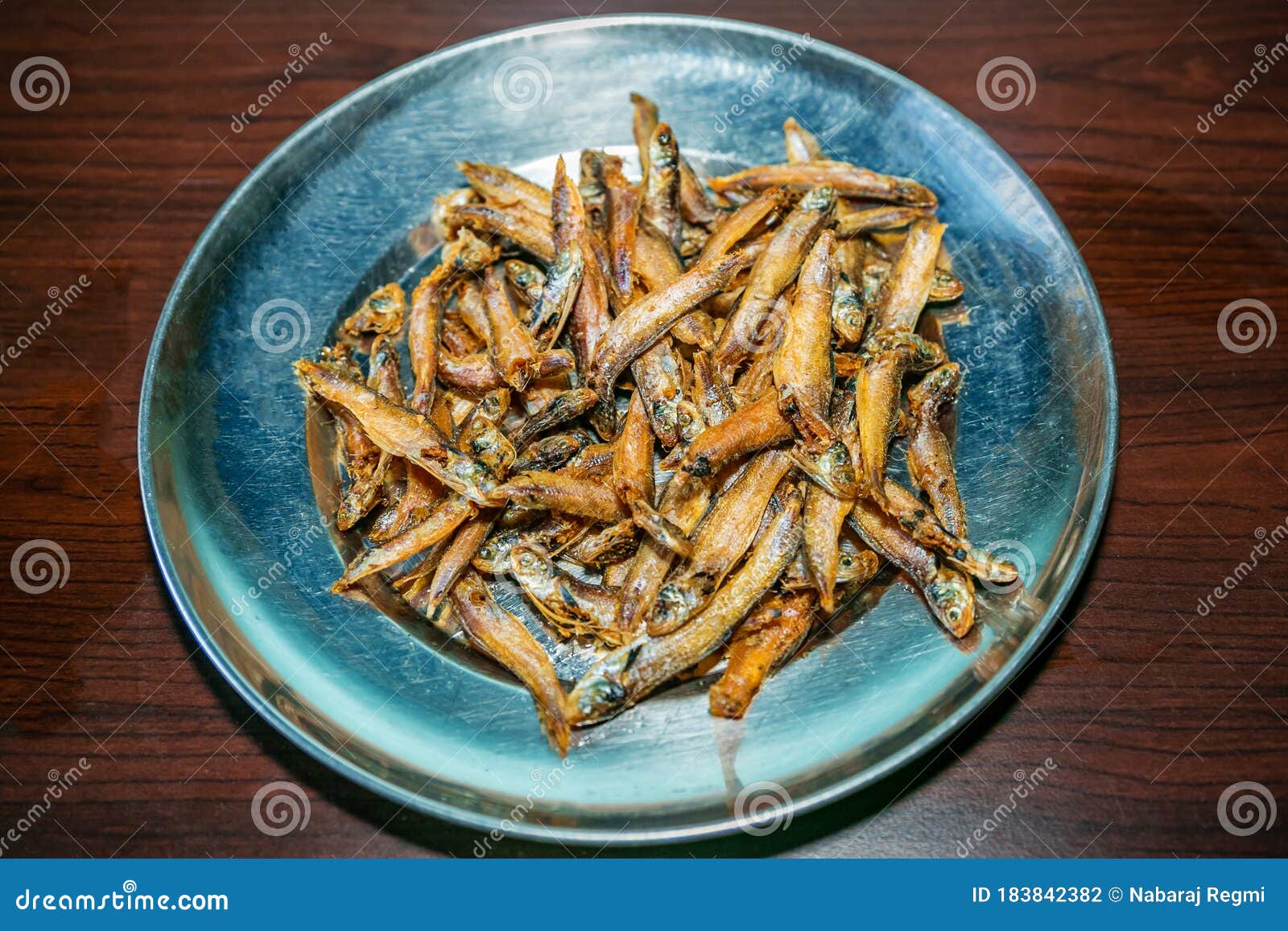 Deep Fried Fish on a plate stock photo. Image of cooking - 183842382