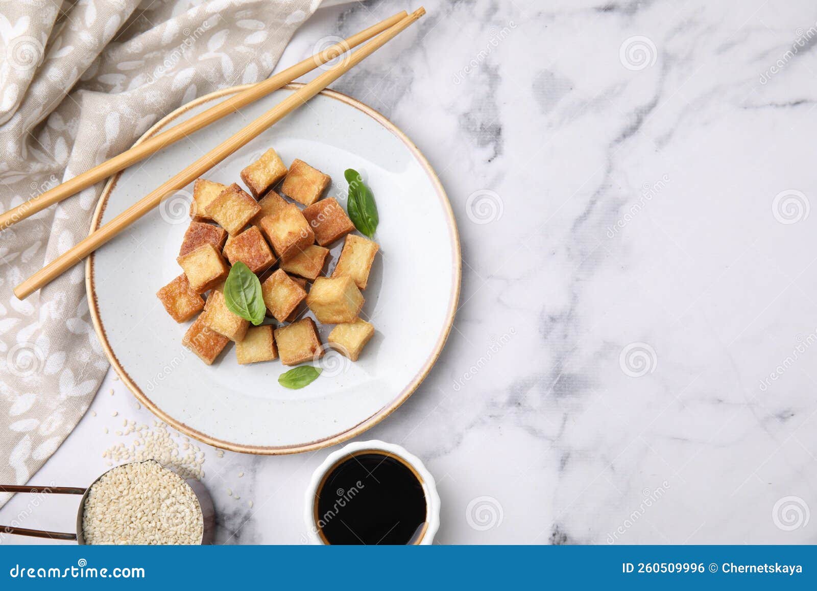 Delicious Fried Tofu with Basil Served on White Marble Table, Flat Lay ...