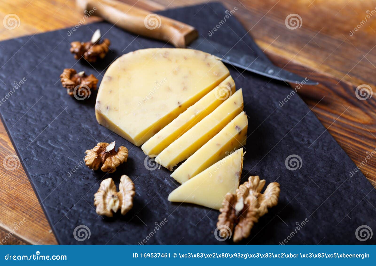 Delicious Gouda Cheese with Walnut Stock Image - Image of cutting ...