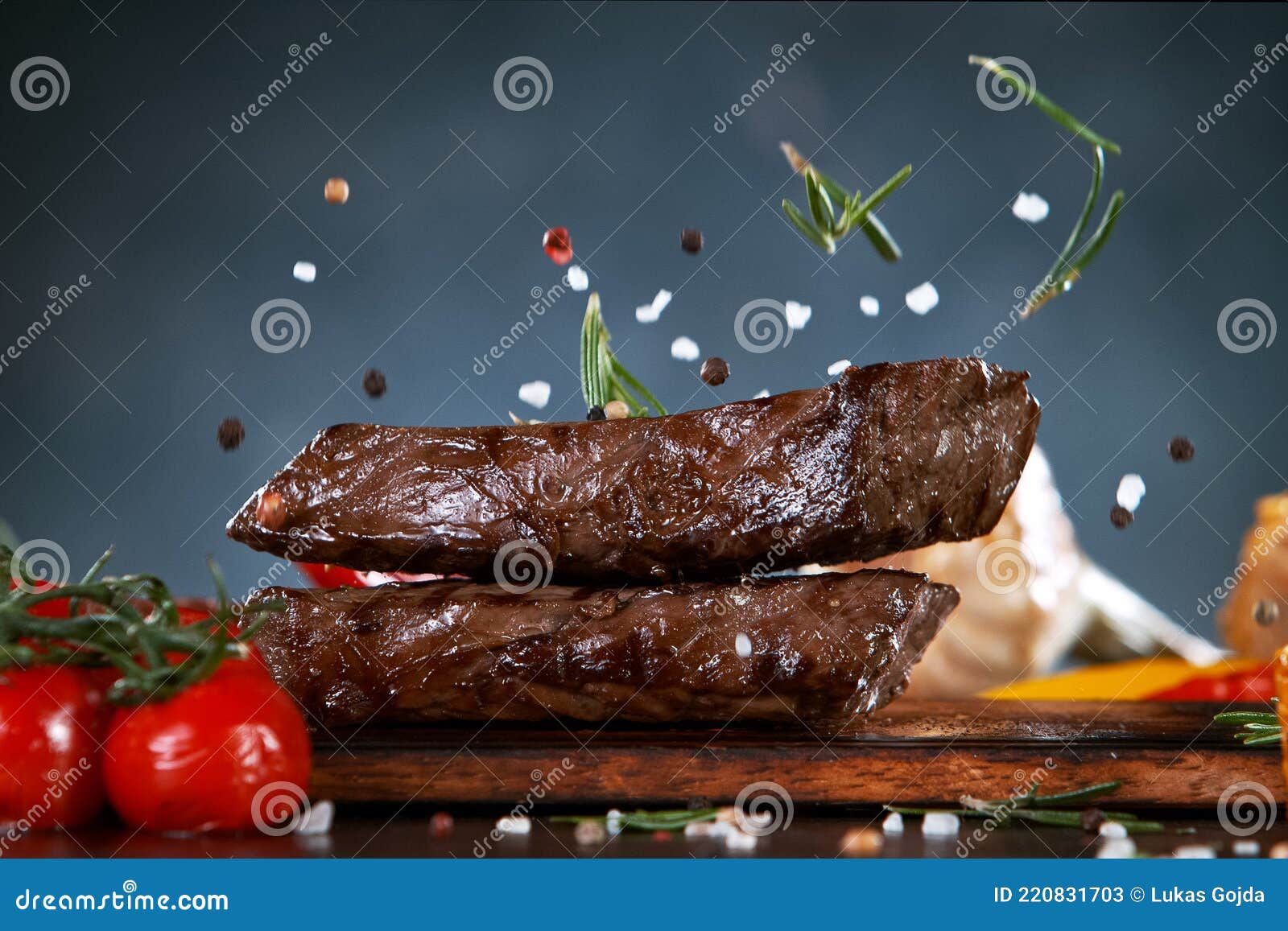 Delicious Grilled Beef Steaks Falling Down on Kitchen Board Stock Image ...