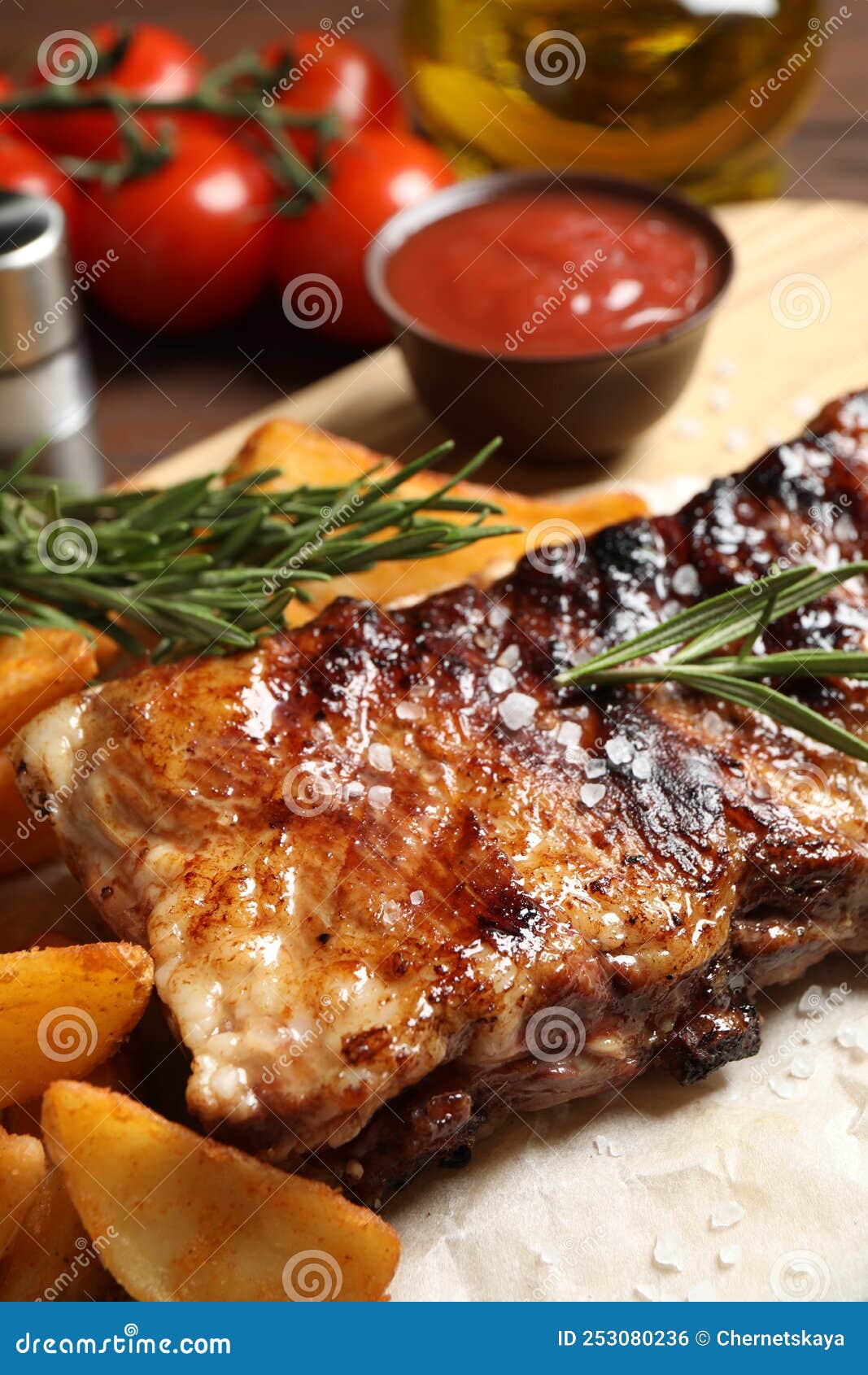 Delicious Grilled Ribs and Garnish, Closeup View Stock Photo - Image of ...