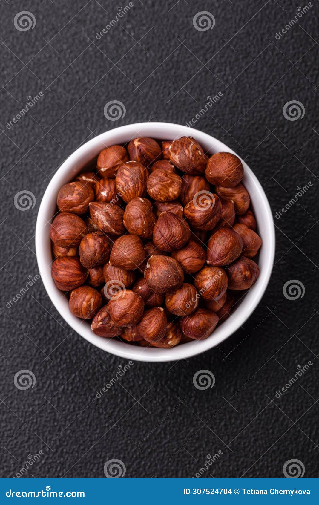 Delicious Hazelnut Whole, Raw, without Shell, on a Dark Concrete ...