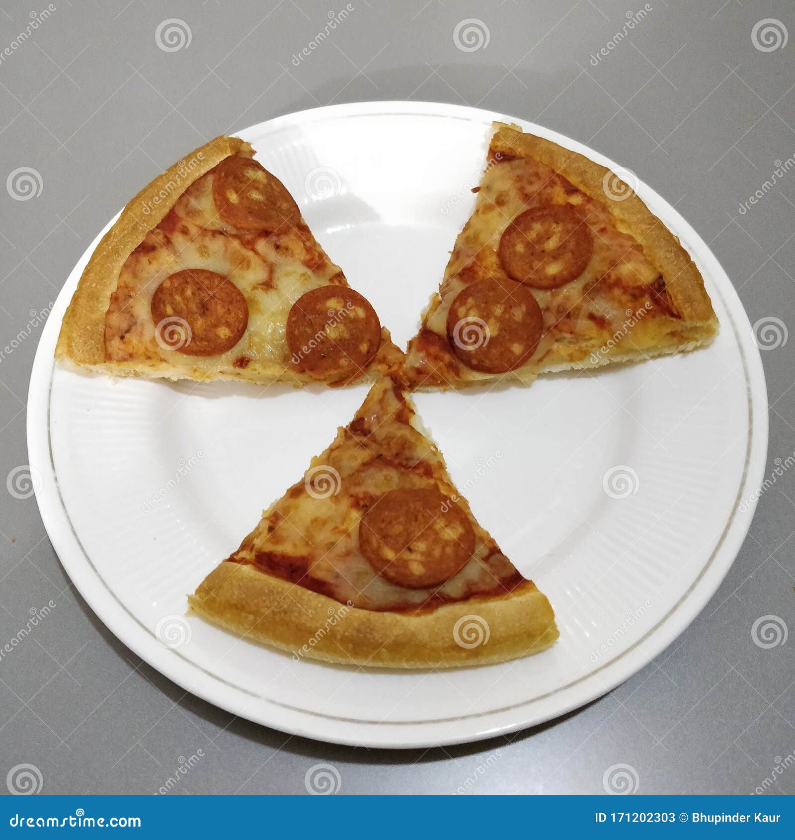 Delicious and Healthful Pepperoni Pizza Triangular Shaped Sliced in a ...