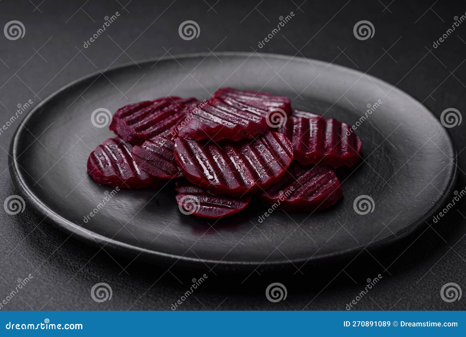 Delicious Healthy Boiled Ruby-colored Beets Sliced ??on a Black Plate ...