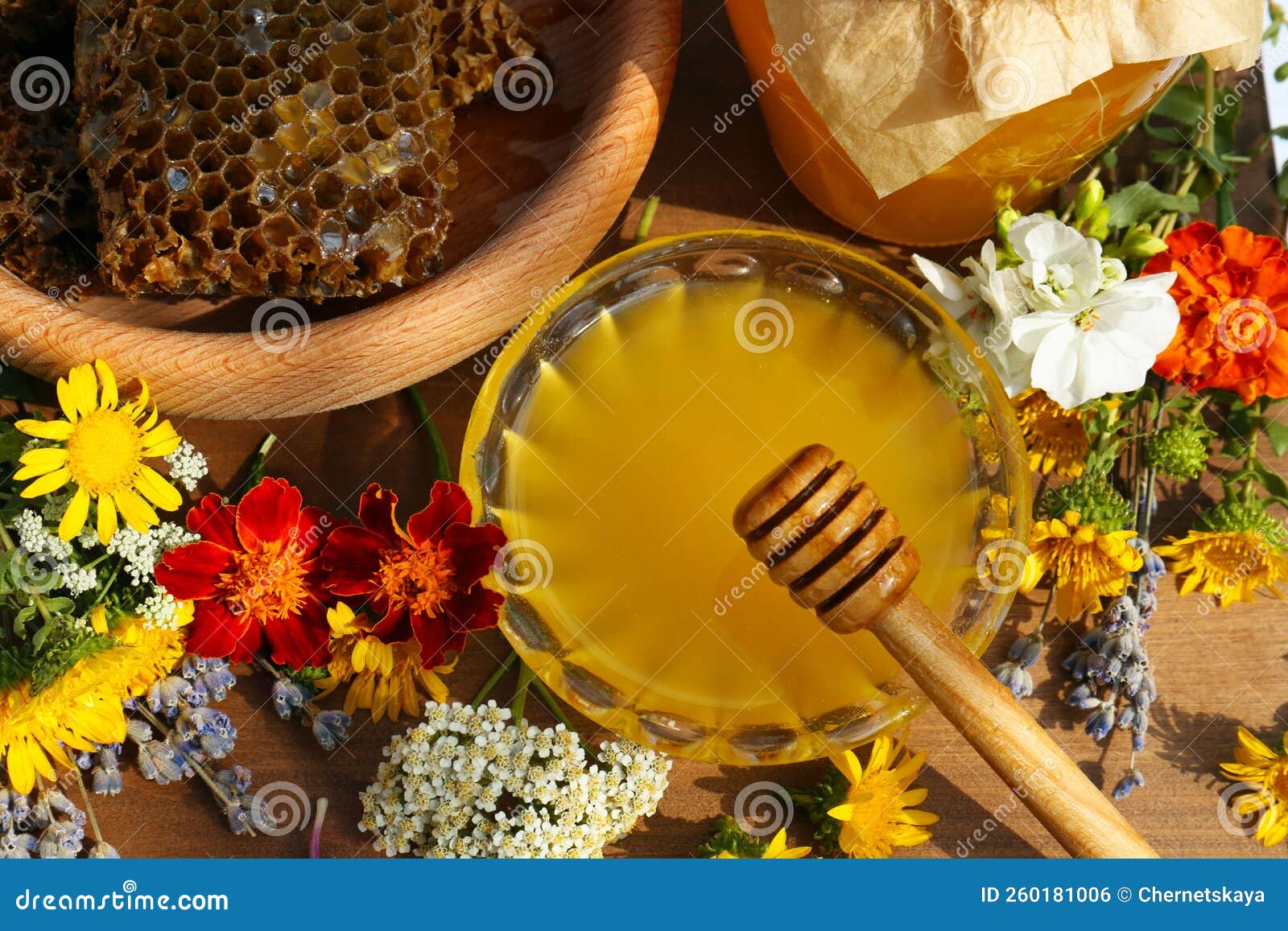 Delicious Honey, Combs and Different Flowers on Wooden Table, Flat Lay ...