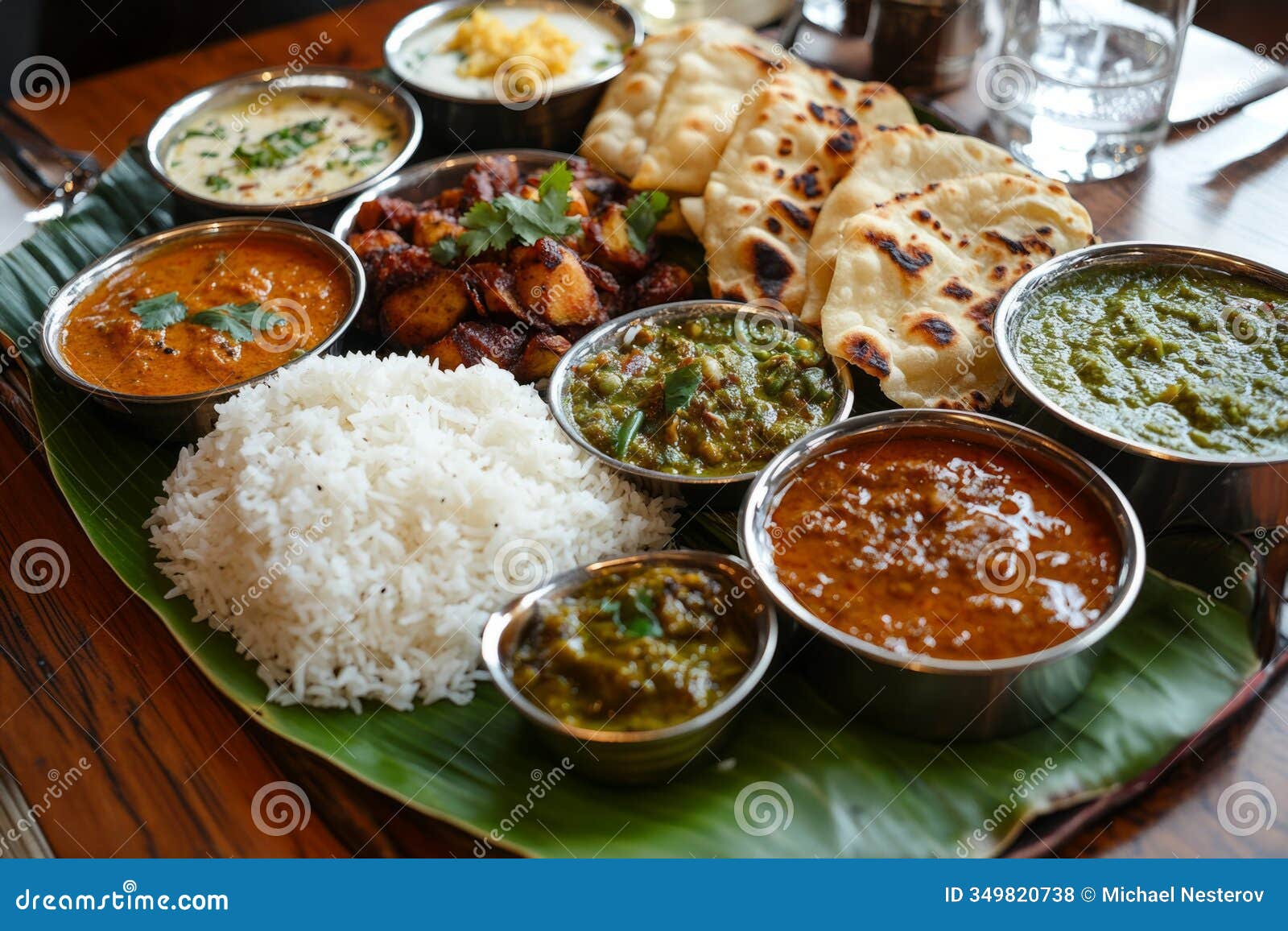 Delicious Indian Thali Served on Banana Leaf with Rice and Curry Stock ...
