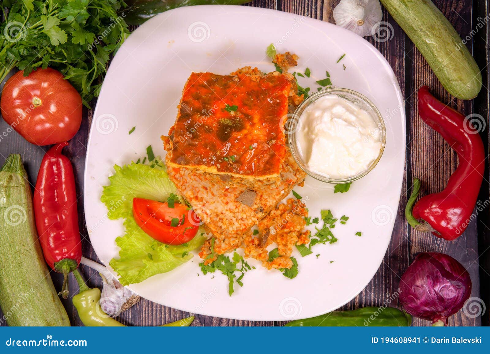 Delicious Lamb Pluck with Rice and Yogurt on a Plate on the Table Stock ...