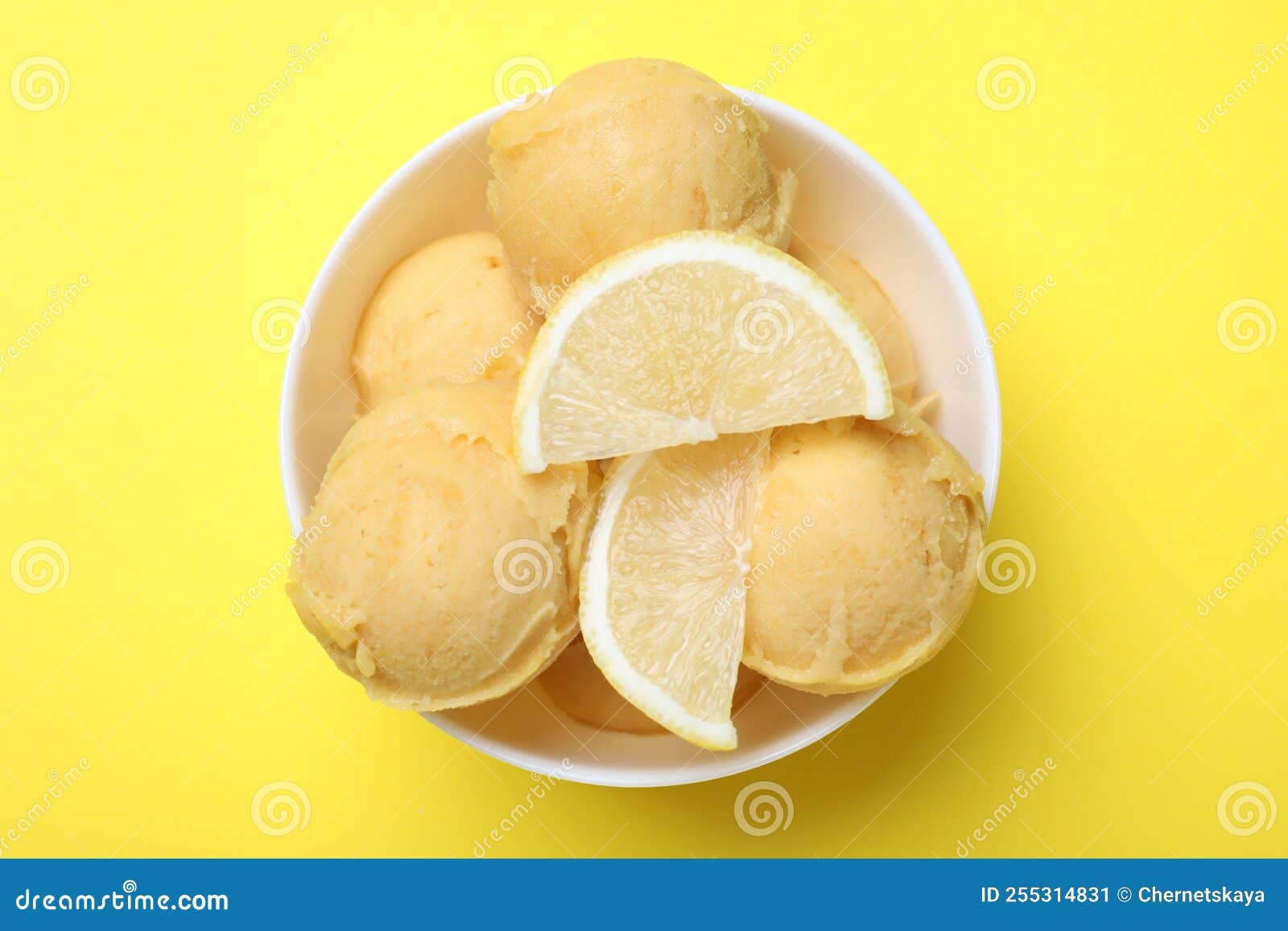 Delicious Lemon Ice Cream on Yellow Background, Top View Stock Image ...