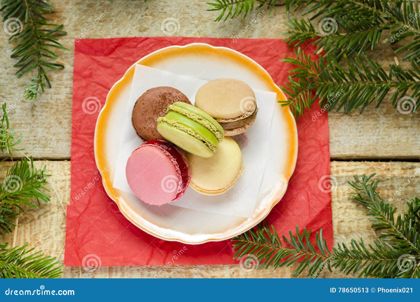 Delicious Macaroons on Plate, Pine Trees in Corners Stock Image - Image ...