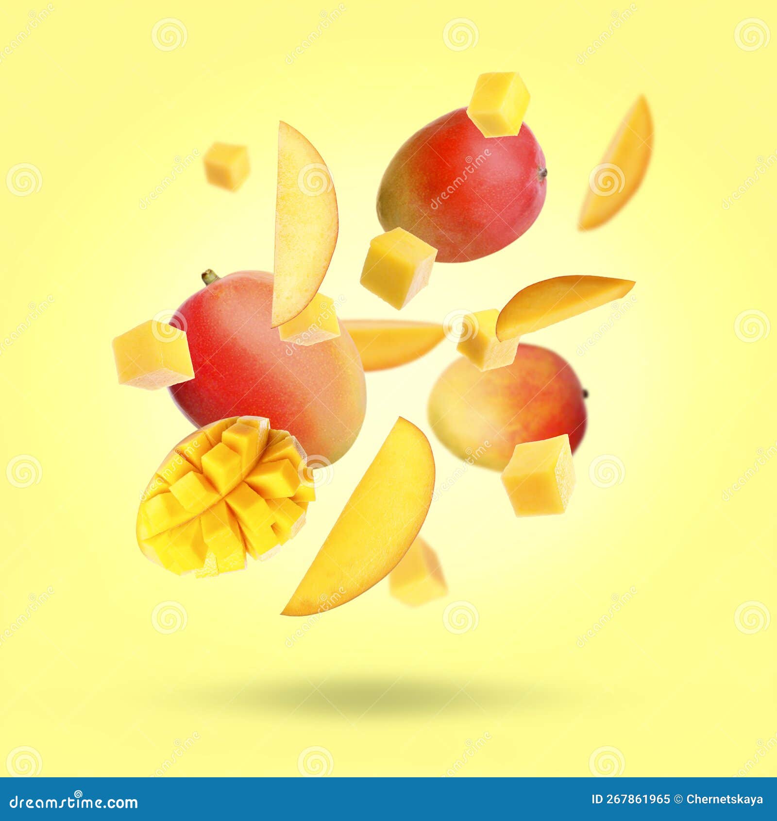 Delicious Mango Fruits Falling on Pale Yellow Background Stock Image ...