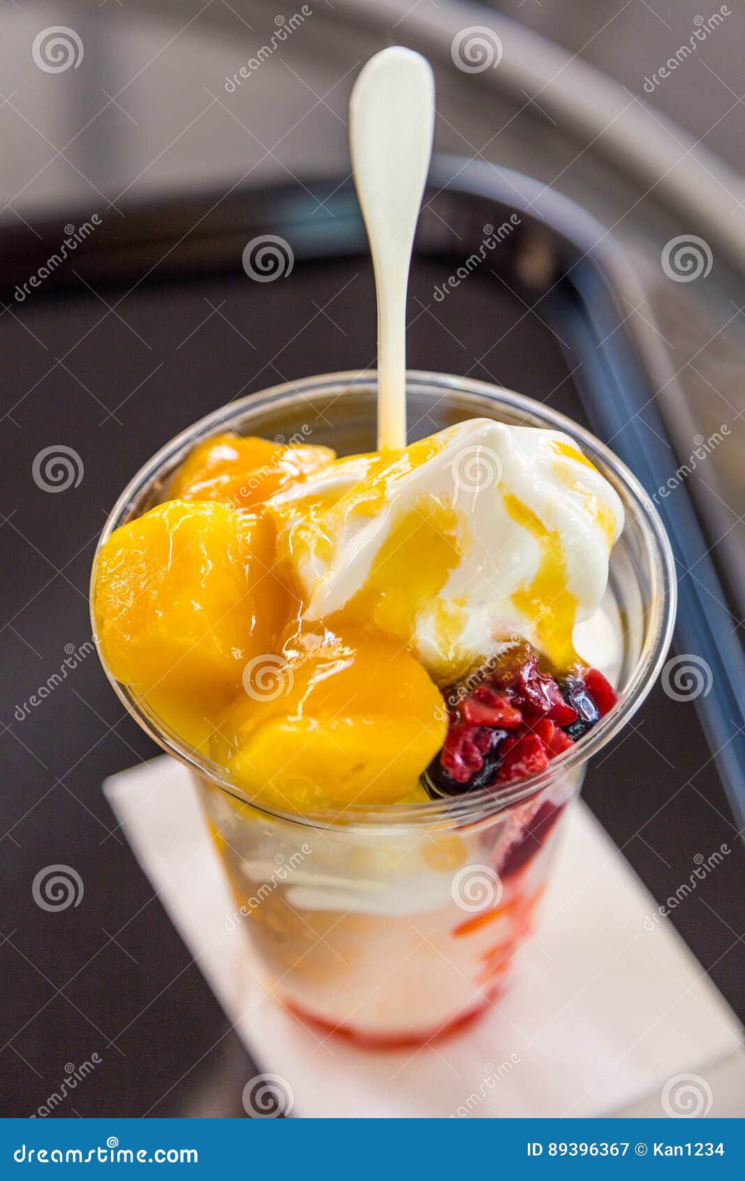 Delicious Mango Ice Cream Sundae in Plastic Cup Stock Image - Image of ...