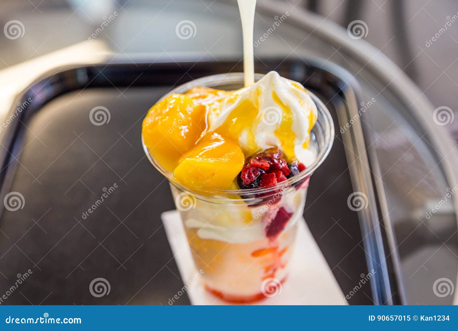 Delicious Mango Ice Cream Sundae in Plastic Cup Stock Image - Image of ...