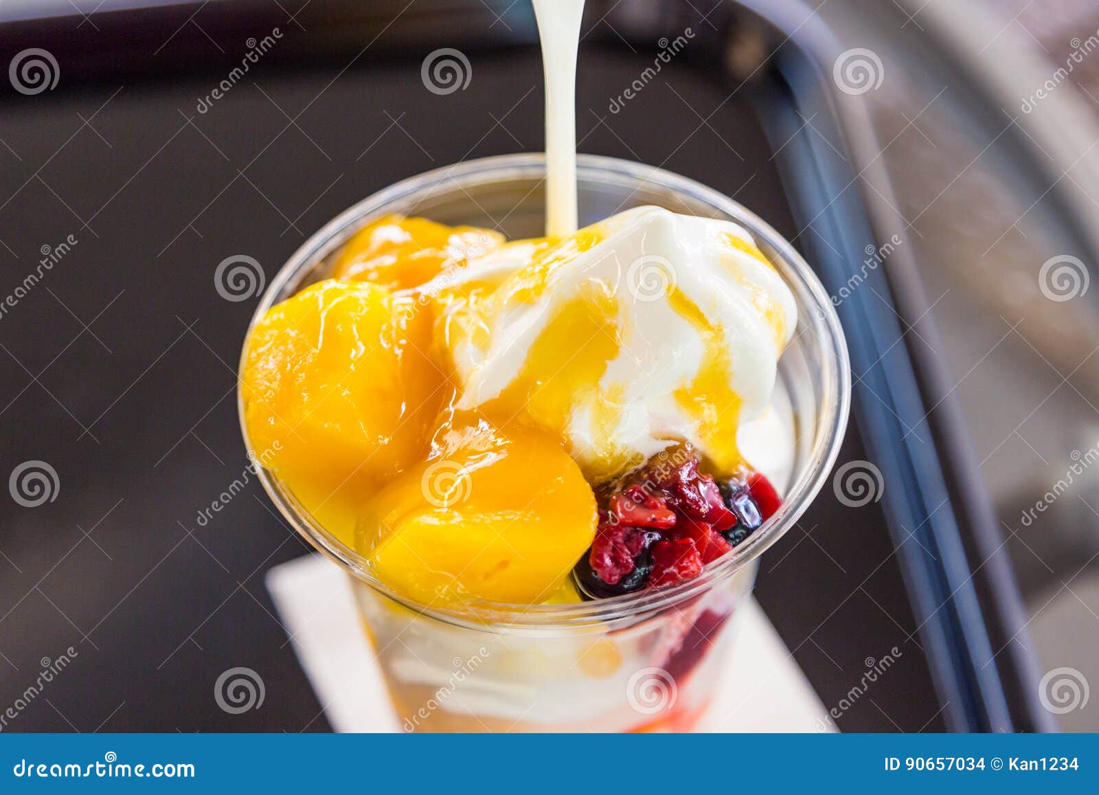 Delicious Mango Ice Cream Sundae in Plastic Cup Stock Photo - Image of ...