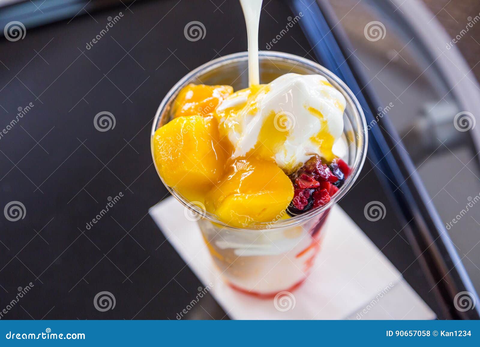 Delicious Mango Ice Cream Sundae in Plastic Cup Stock Photo - Image of ...