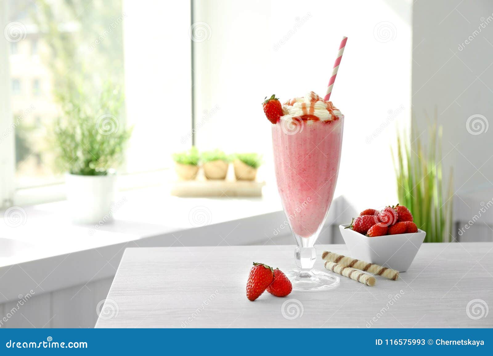 Delicious Milkshake on Table Stock Image - Image of berry, milkshake ...