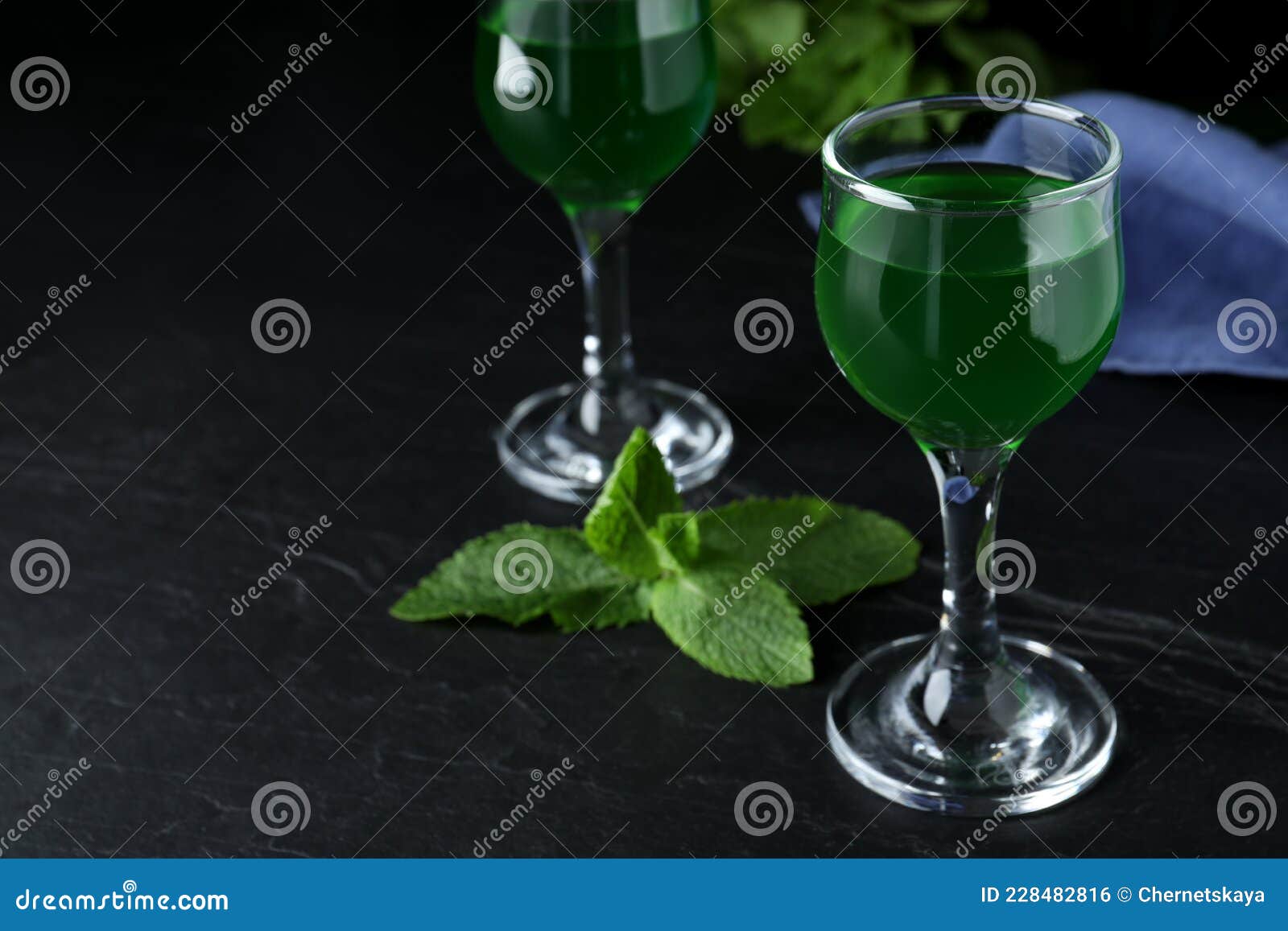 Delicious Mint Liqueur on Black Table. Space for Text Stock Photo ...