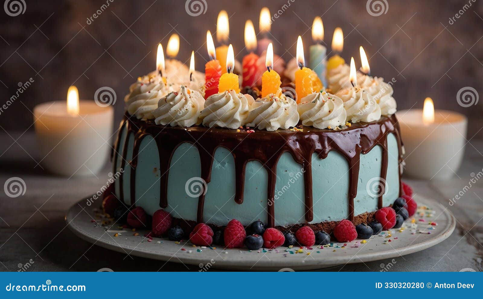 Delicious Multi-Layered Celebration Cake with Berries and Candles on ...