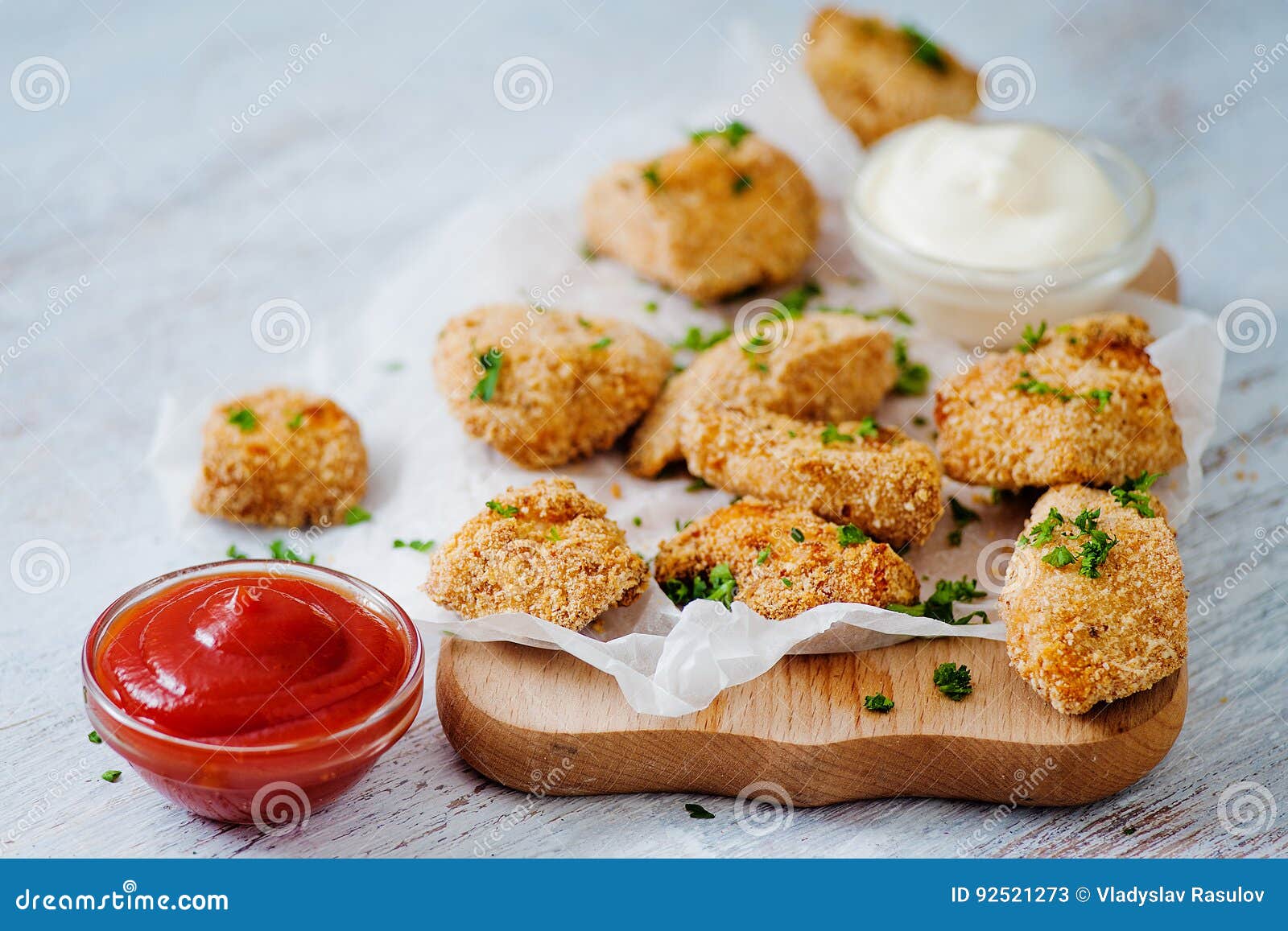 Delicious Nuggets Served on the Board with Two Sauces Stock Image ...
