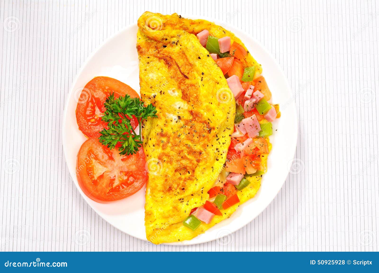 Delicious Omelet with Tomato, Pepper, Ham, Basil Stock Photo - Image of ...