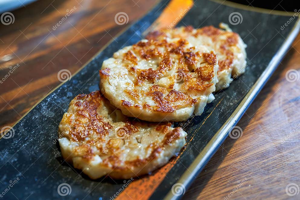 A Delicious Pan-fried Lotus Root Cake Stock Photo - Image of cheese ...