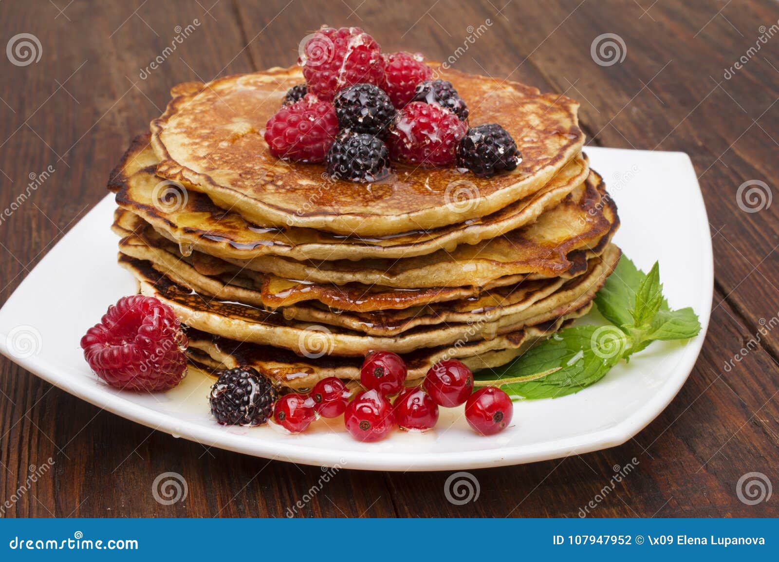 Delicious Pancakes with Berries and Maple Syrup Stock Photo - Image of ...