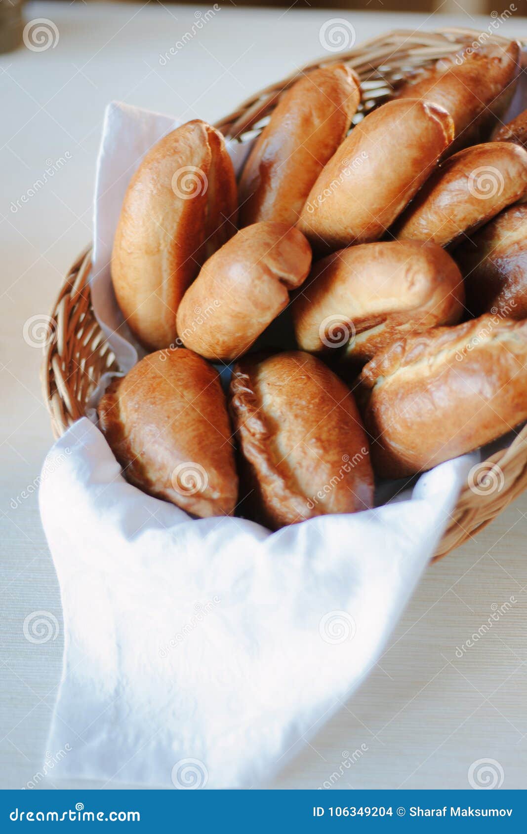 Delicious Pastries on Basket Over White Table. Stock Photo - Image of ...