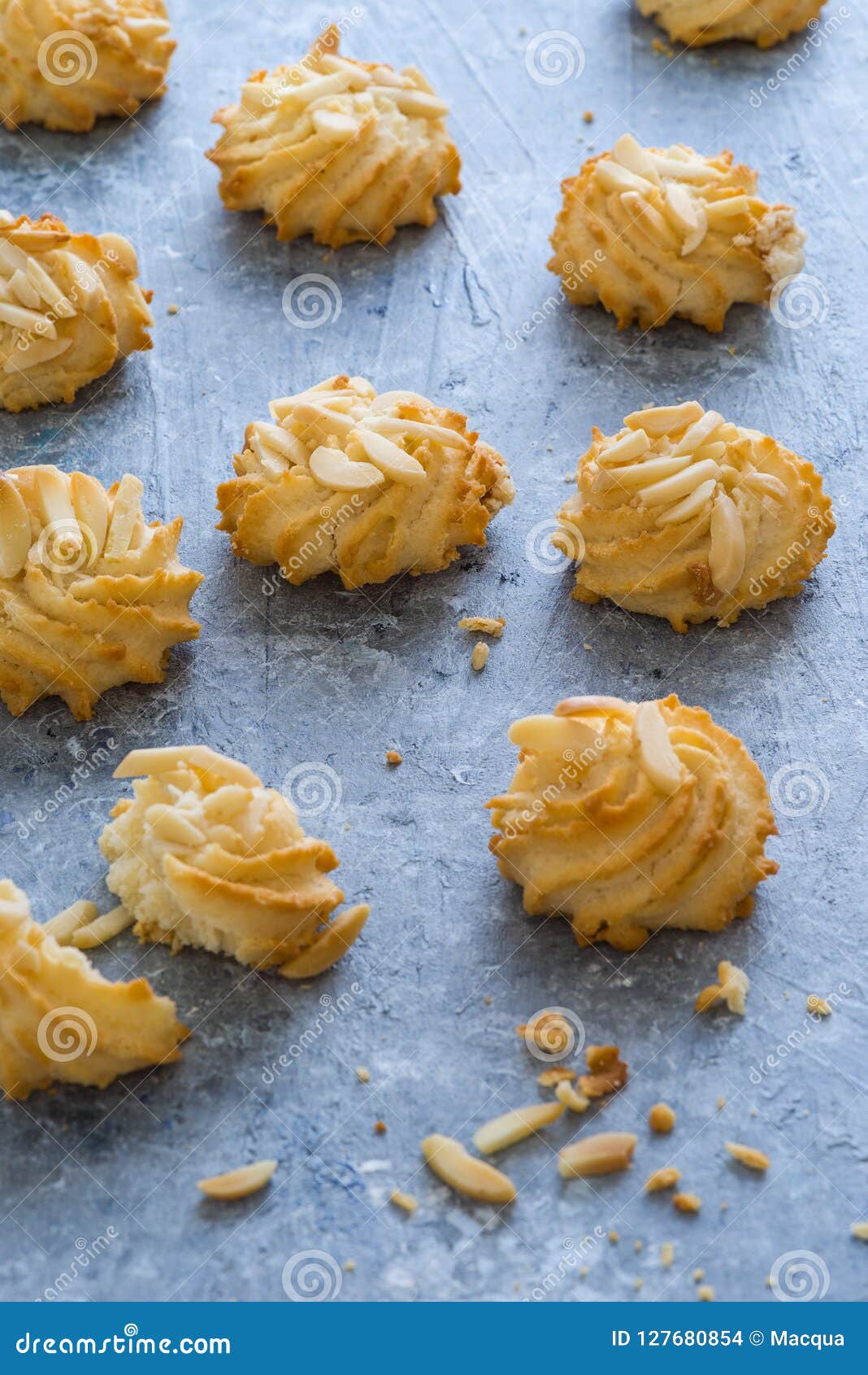 Delicious Pastry with Almond on Blue Background Stock Photo - Image of ...
