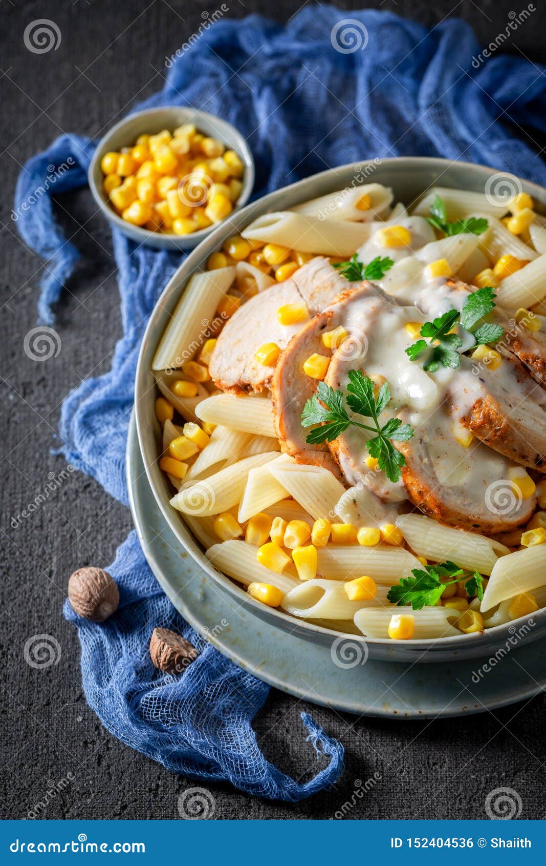 Delicious Penne with Bechamel Sauce, Corn and Chicken Stock Photo ...